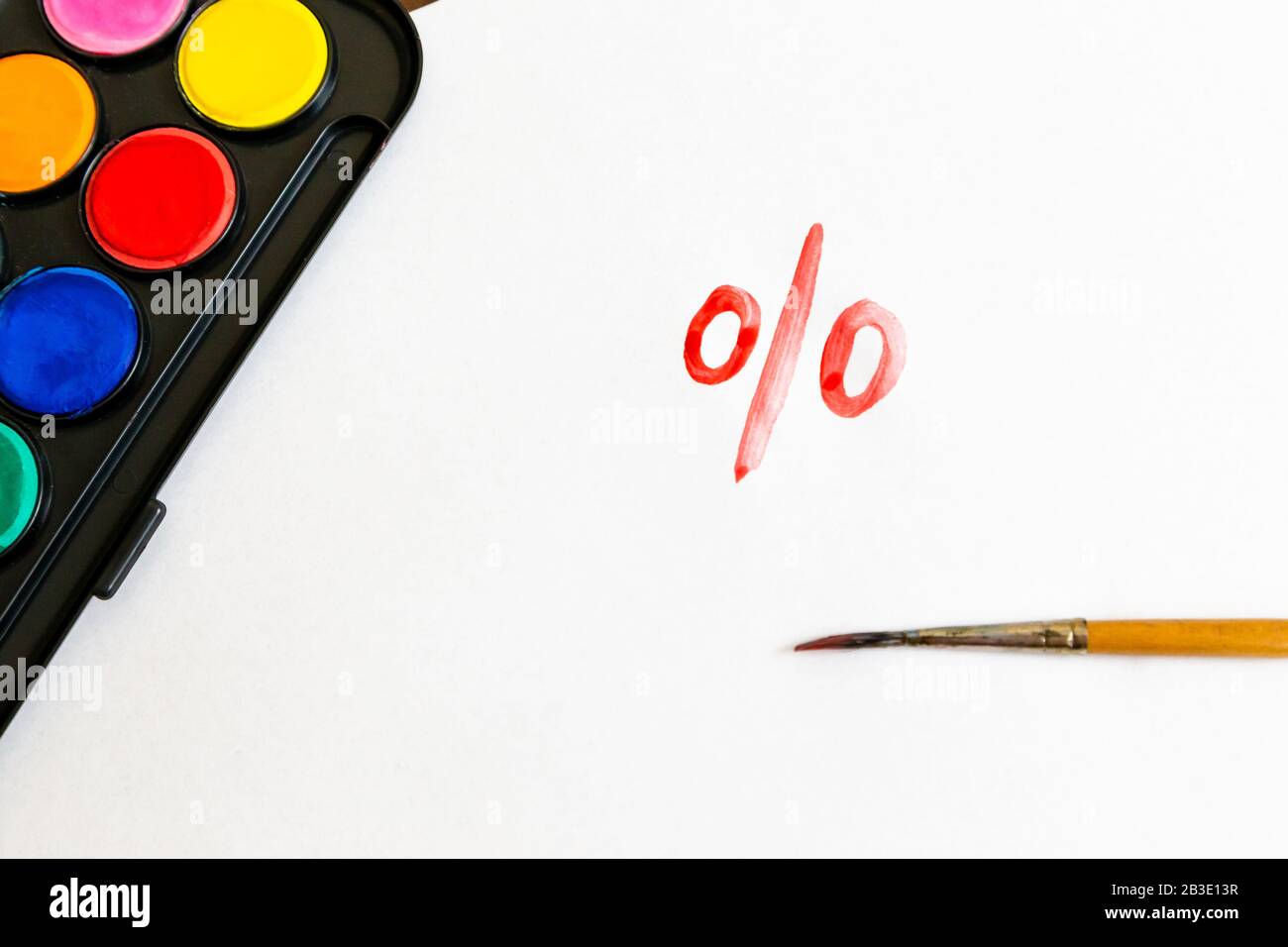 Handwritten discount sign with brush and watercolor paints on white ...