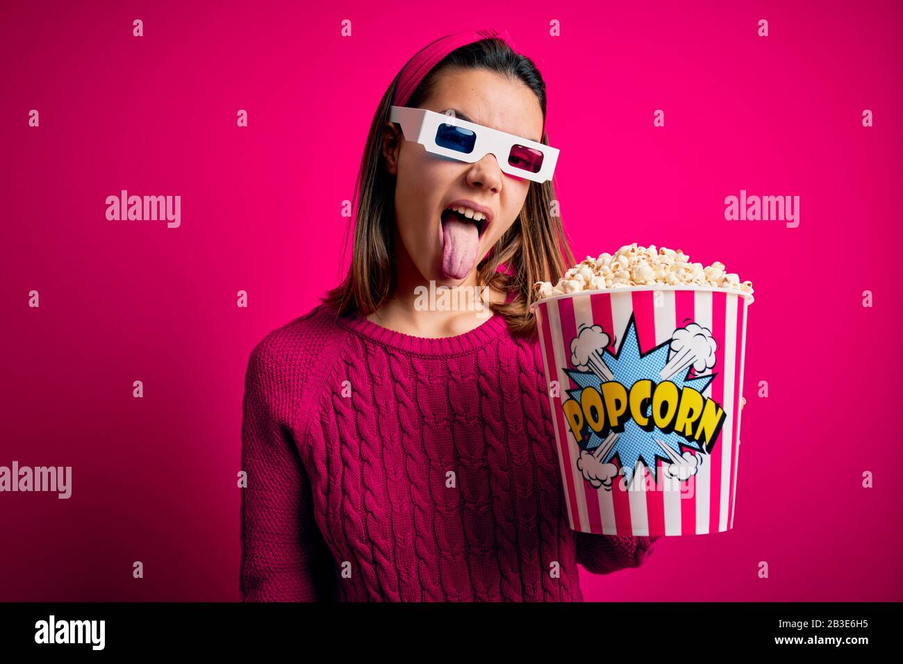 Girl tongue popcorn hi-res stock photography and images - Alamy