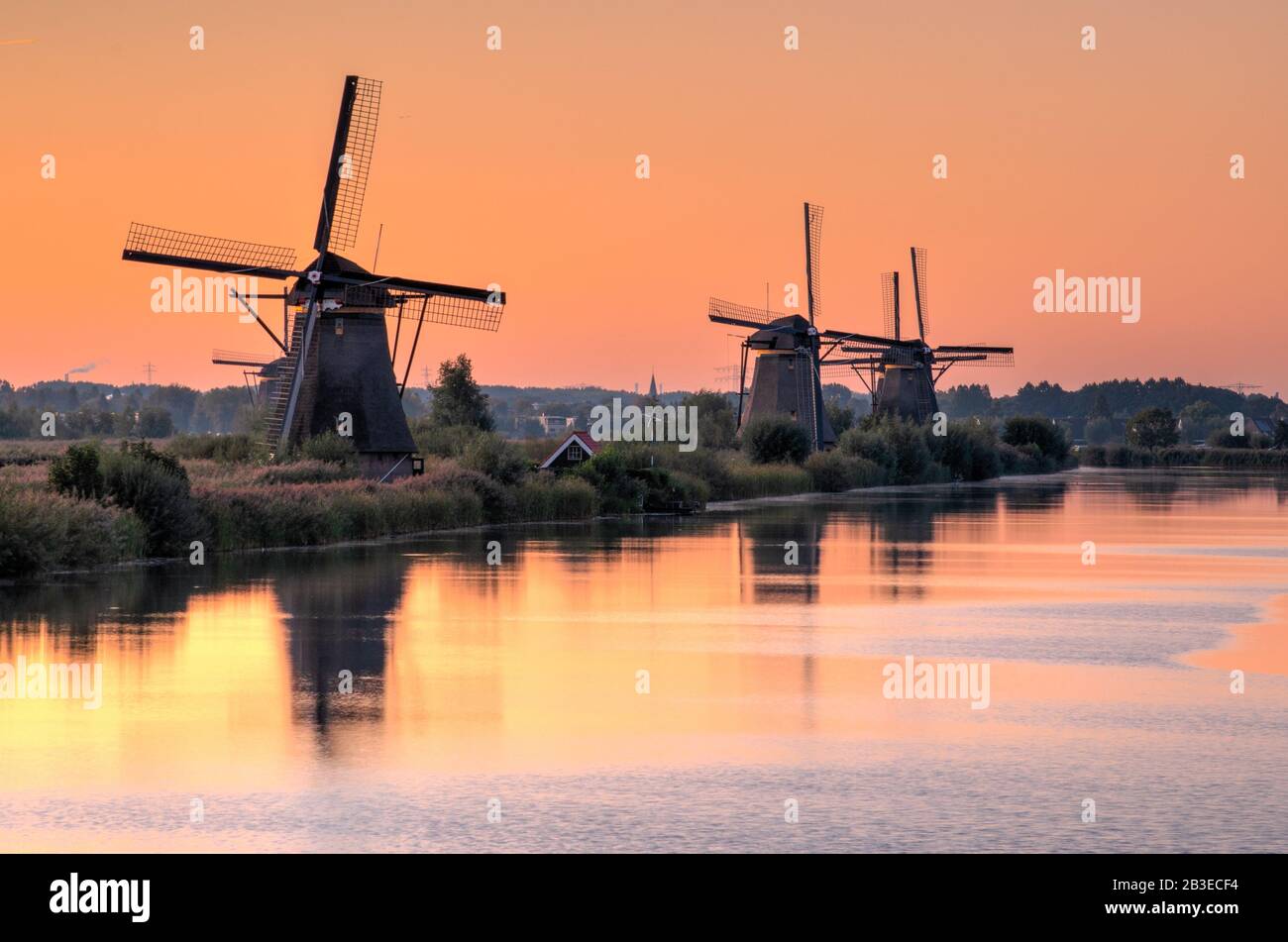 Netherlands rural landscape with windmills at famous tourist site ...