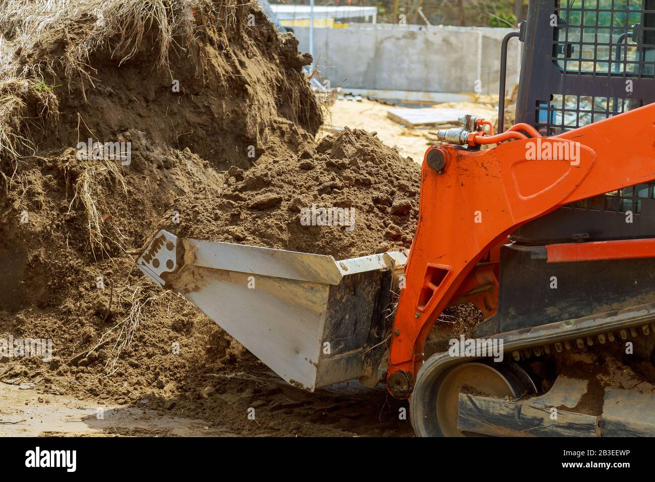 Backhoe grading hi-res stock photography and images - Alamy