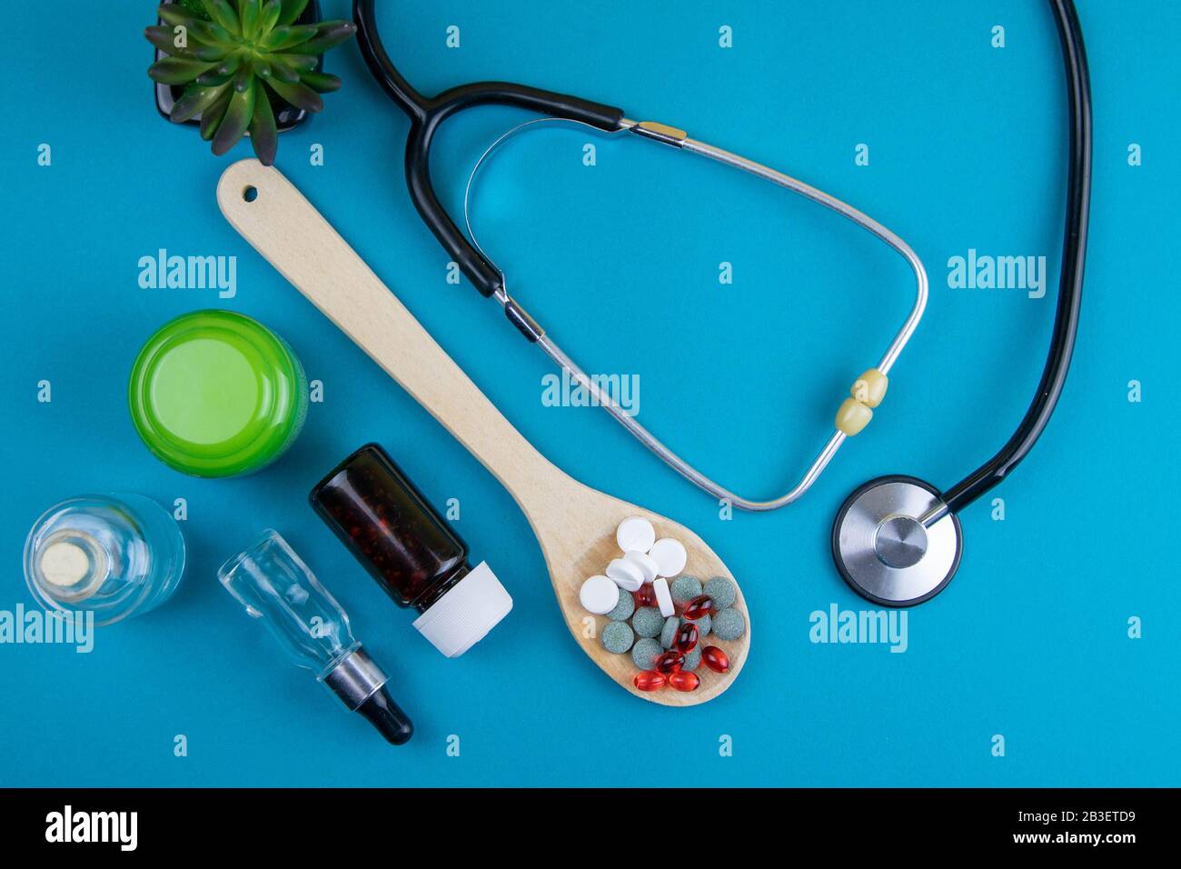 Medicine or pharmacy background. Laboratory table with a various drugs ...