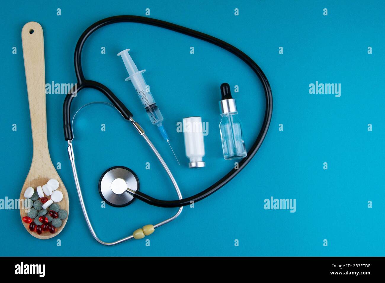 Medicine or pharmacy background. Laboratory table with a various drugs ...