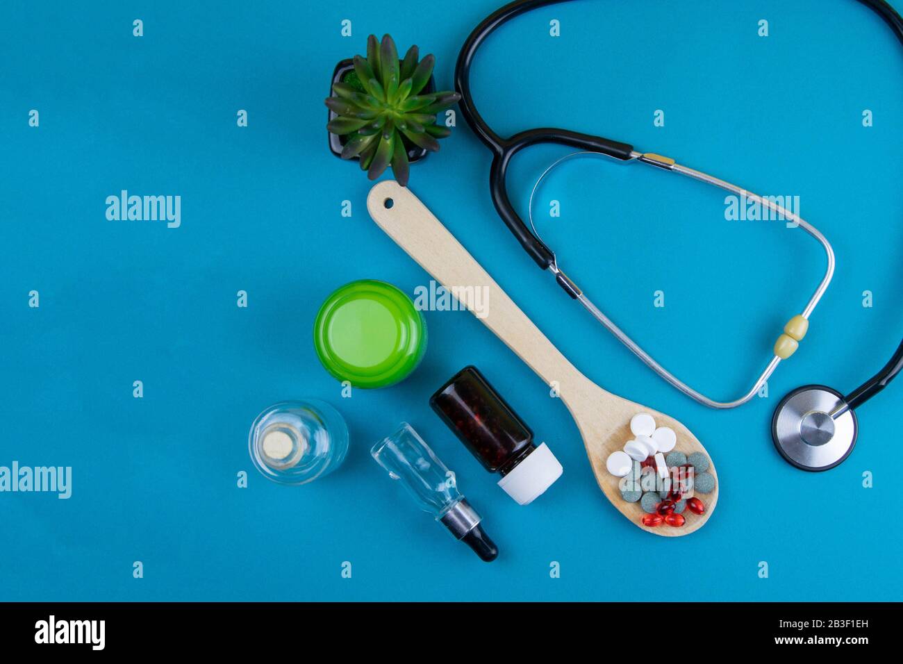 Medicine or pharmacy background. Laboratory table with a various drugs ...