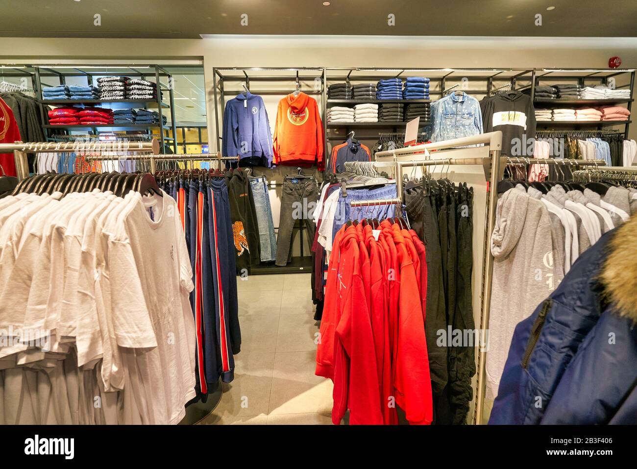HONG KONG, CHINA - JANUARY 23, 2019: clothes on display at H&M store in ...