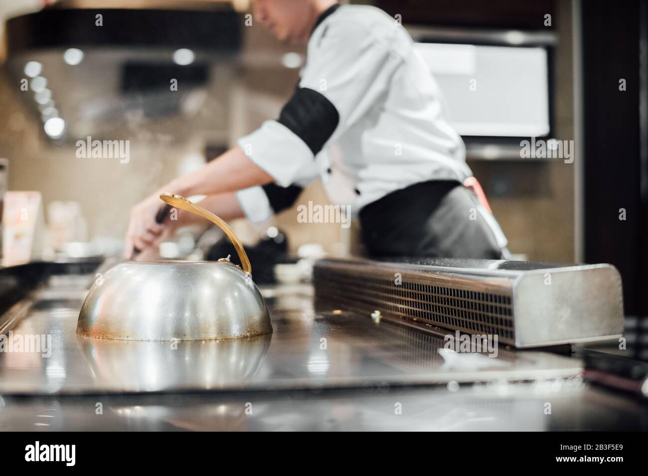 Hand of man take cooking of meat with vegetable grill, Chef cooking ...