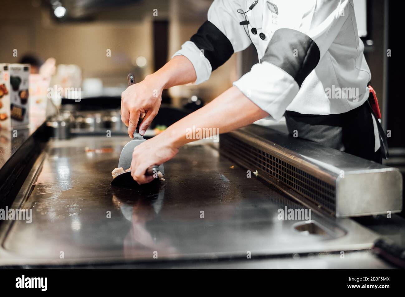 Hand of man take cooking of meat with vegetable grill, Chef cooking ...