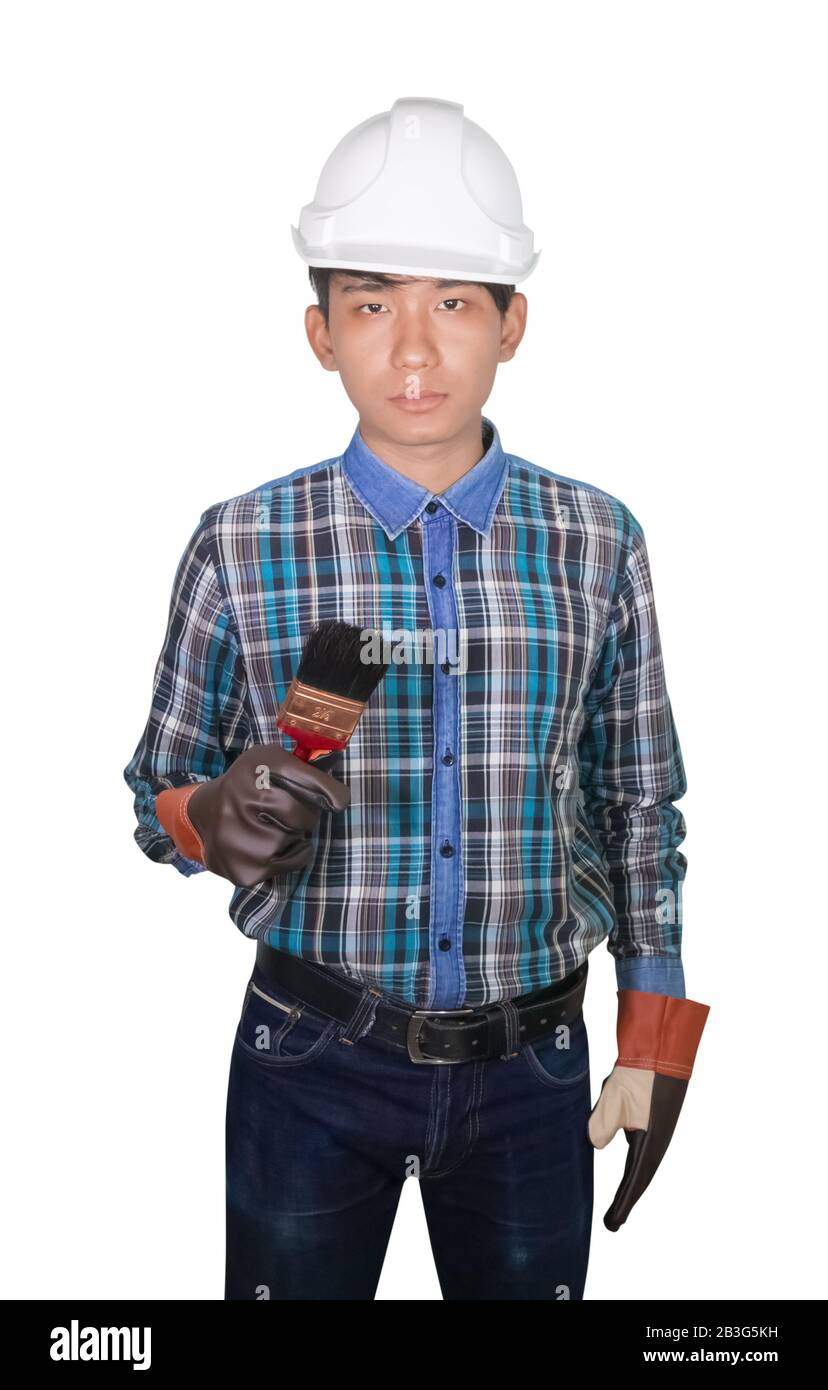 hand of engineer holding paint brush wear Striped shirt blue and glove ...