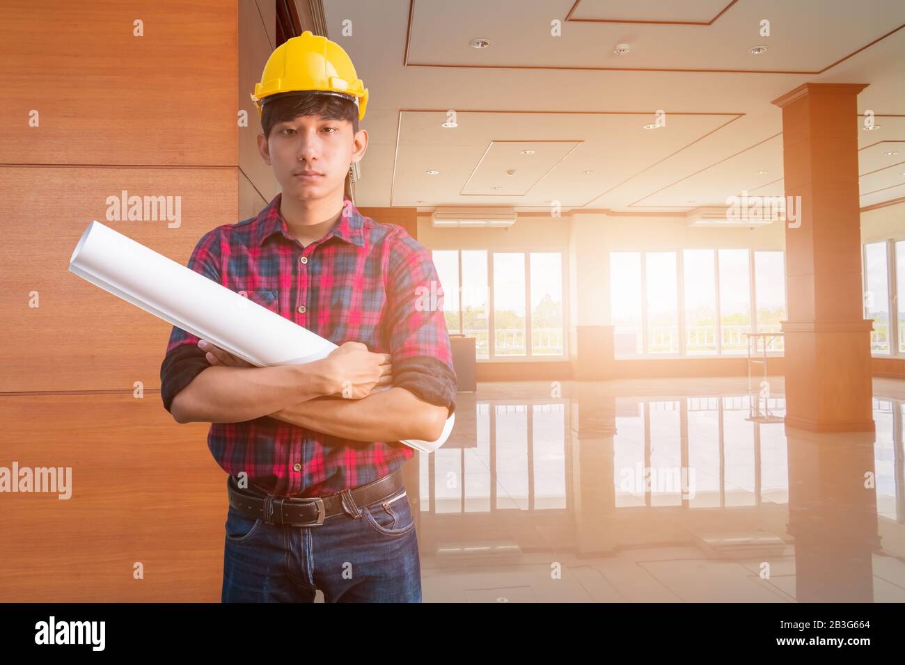 Engineer checking in decorate Interior room completed with hand holding ...