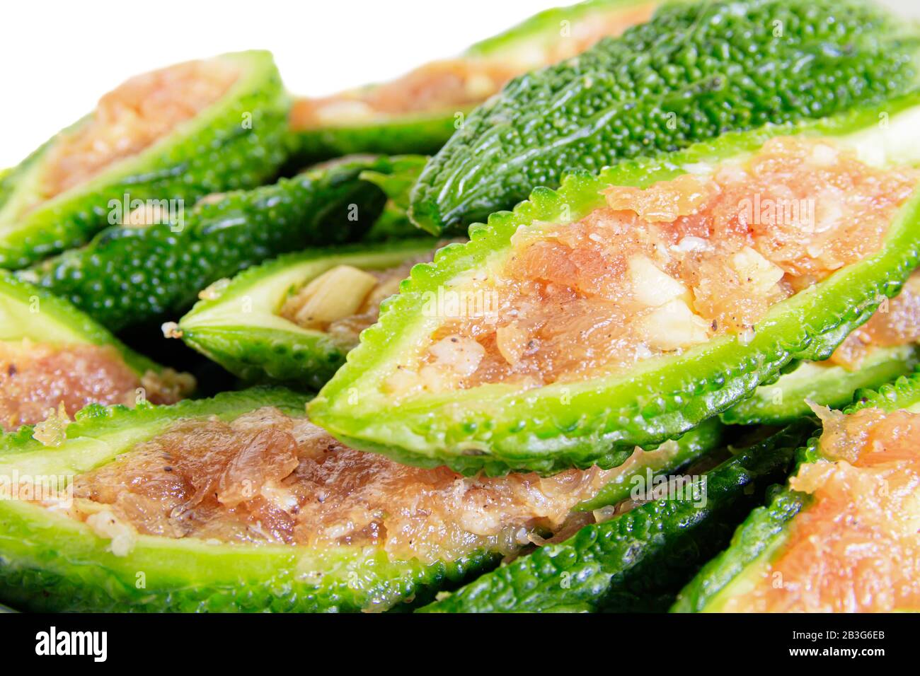 Close up bitter gourd pile with stuffed hack pork and garlic black ...