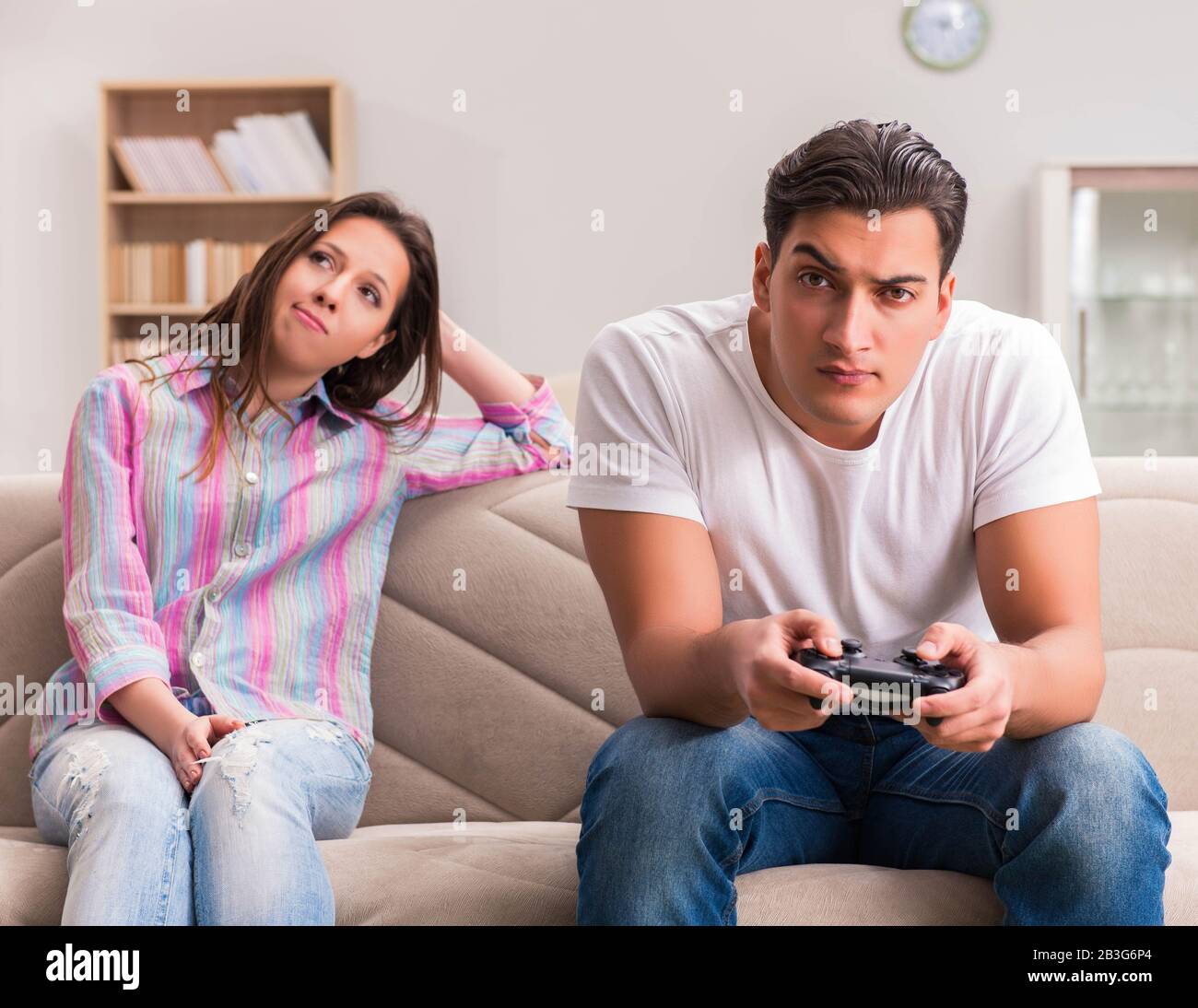 The young family suffering from computer games addiction Stock Photo ...