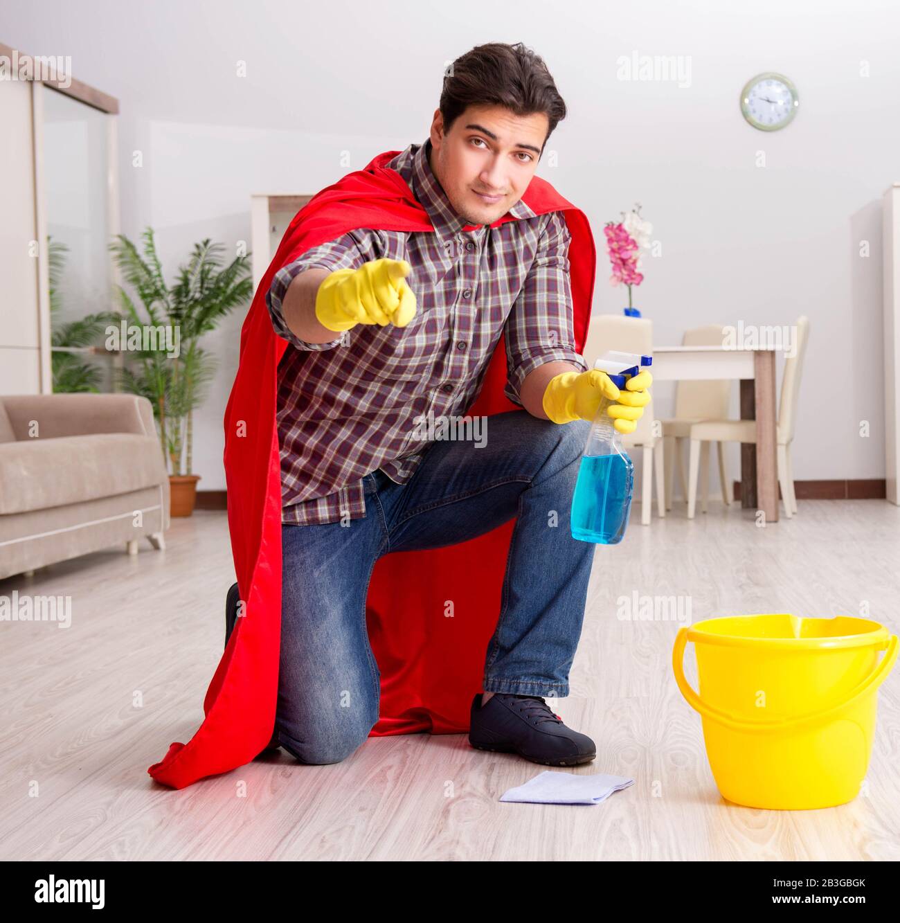 Super hero husband cleaning hi-res stock photography and images - Alamy
