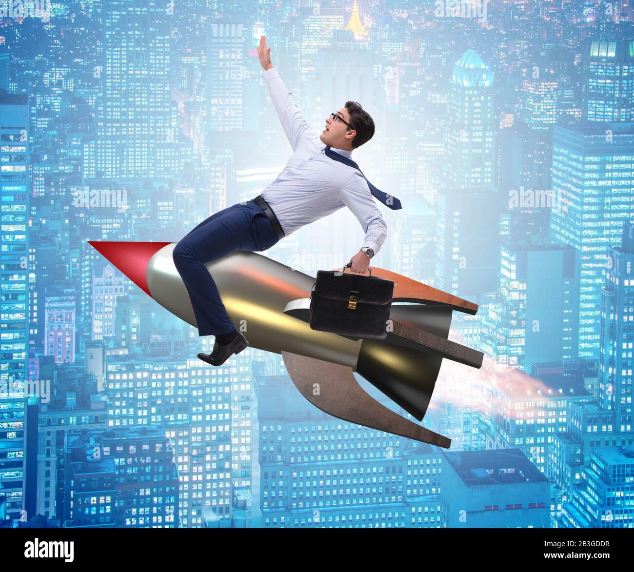 The businessman flying on rocket in business concept Stock Photo - Alamy