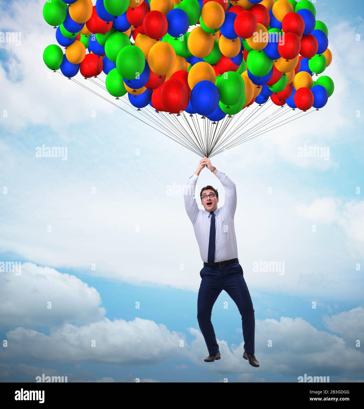 The businessman flying on balloons in challenge concept Stock Photo - Alamy