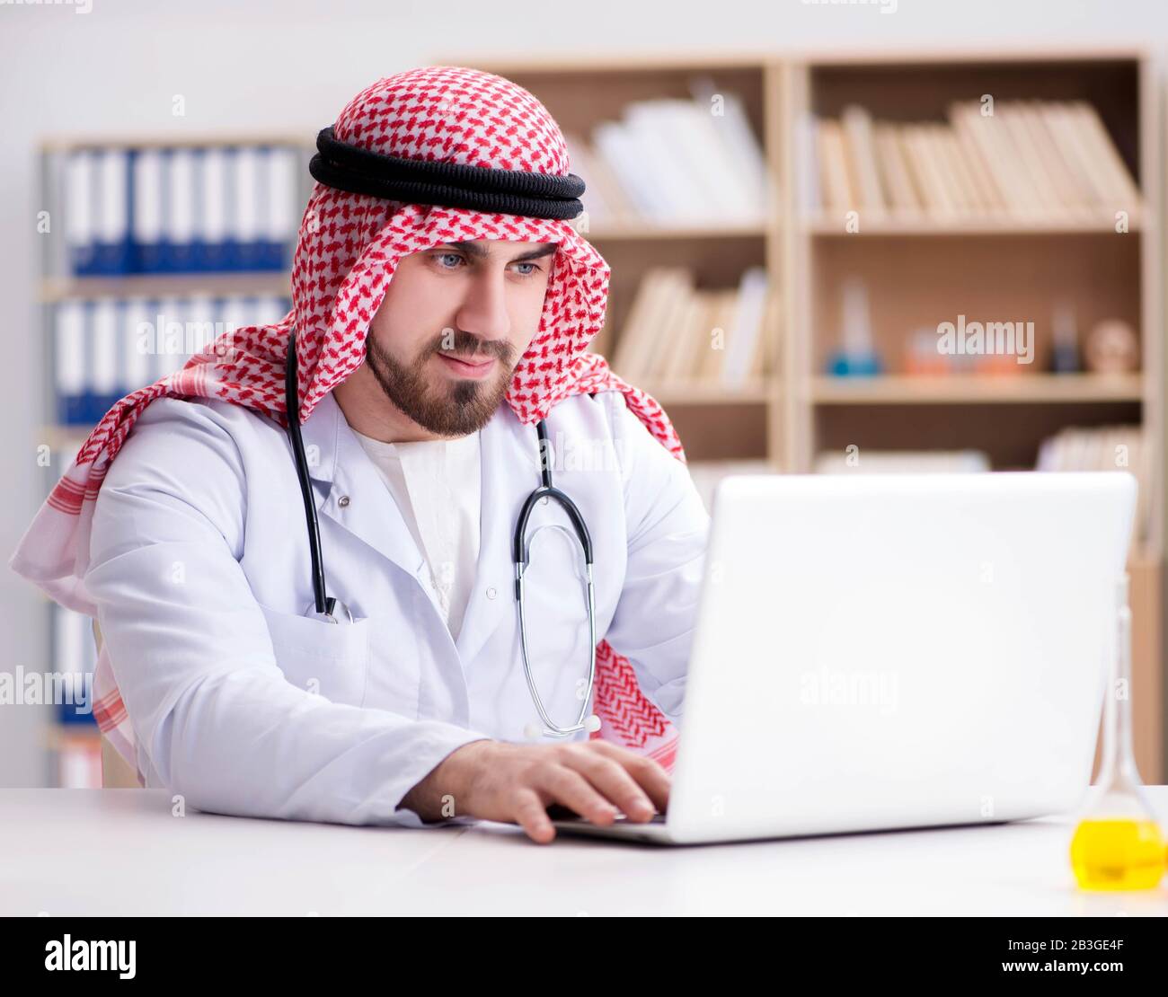 The arab doctor working in the lab hospital Stock Photo - Alamy