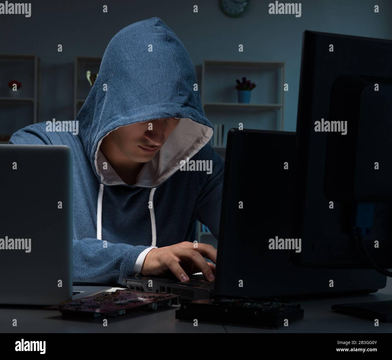 The hacker hacking computer at night Stock Photo - Alamy