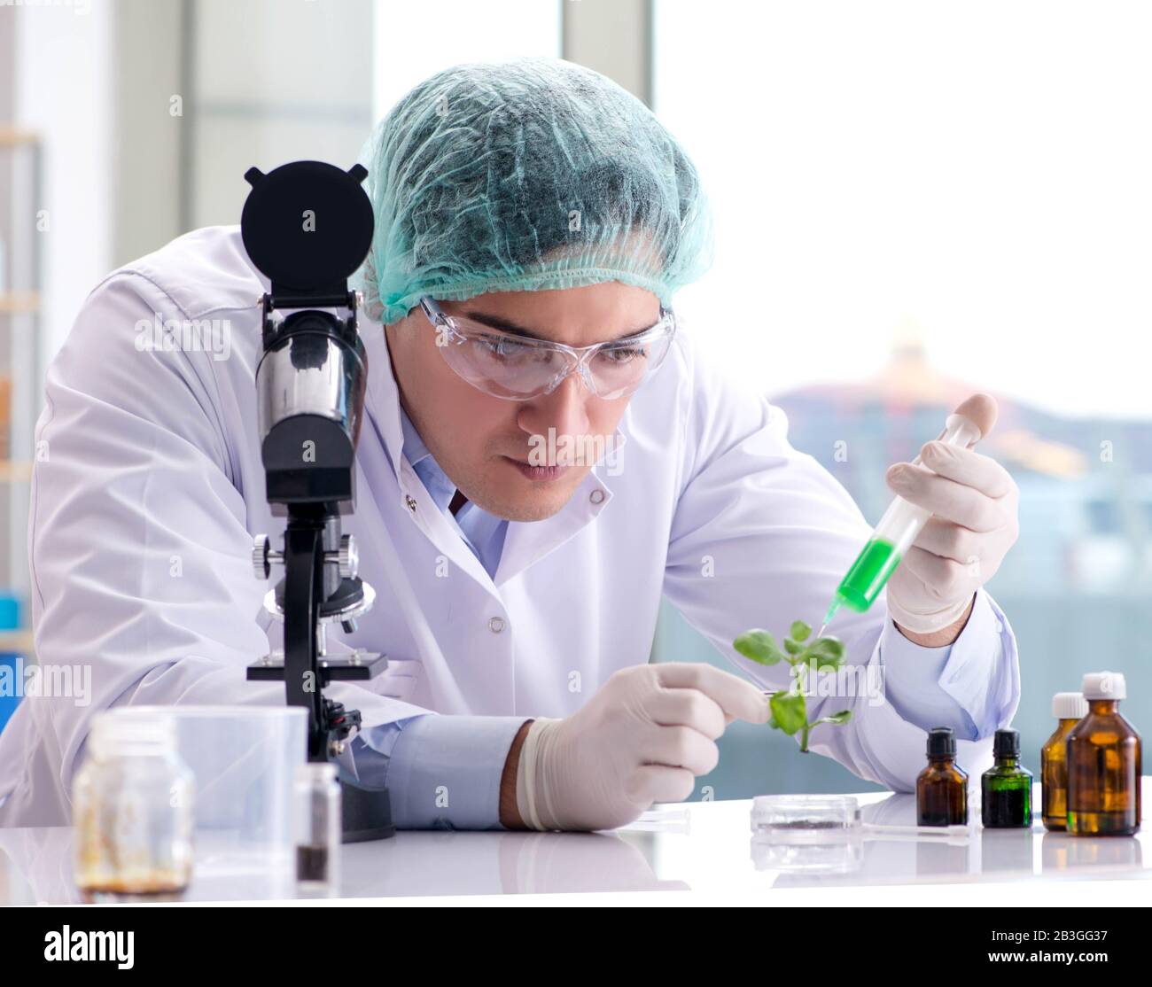 The biotechnology concept with scientist in lab Stock Photo - Alamy
