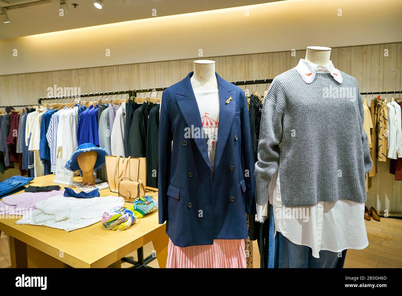 HONG KONG, CHINA - CIRCA JANUARY, 2019: clothes on display at a store ...