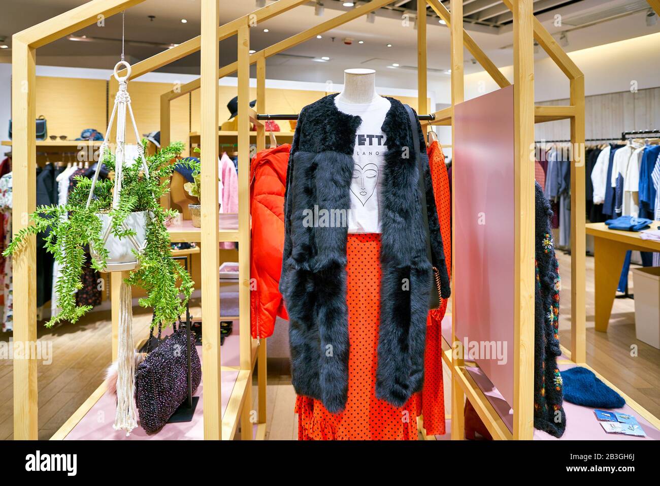 HONG KONG, CHINA - CIRCA JANUARY, 2019: clothes on display at a store ...