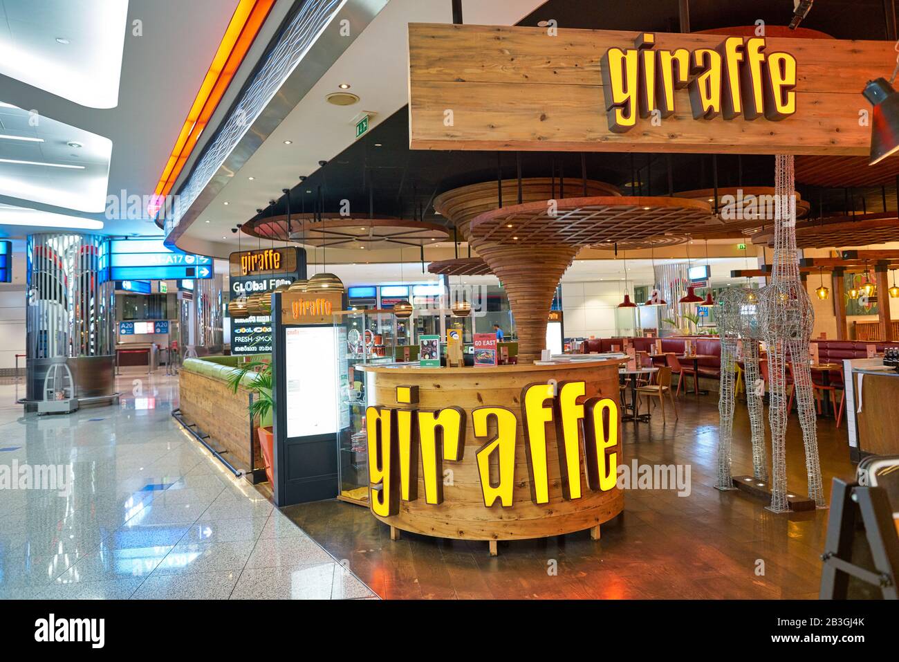 DUBAI, UAE - CIRCA JANUARY 2019: entrance to Giraffe World Kitchen at ...