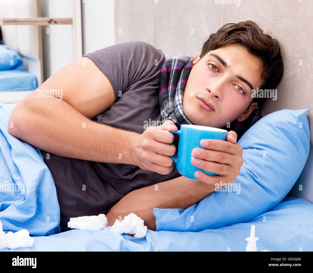 Sick man in blanket taking hi-res stock photography and images - Alamy