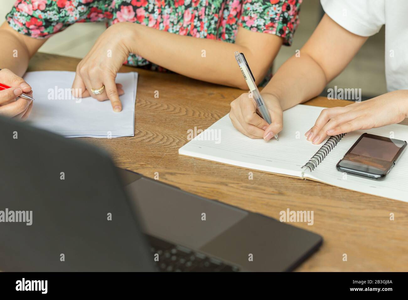 Business team work in cafe and writing on documents paperwork Stock ...