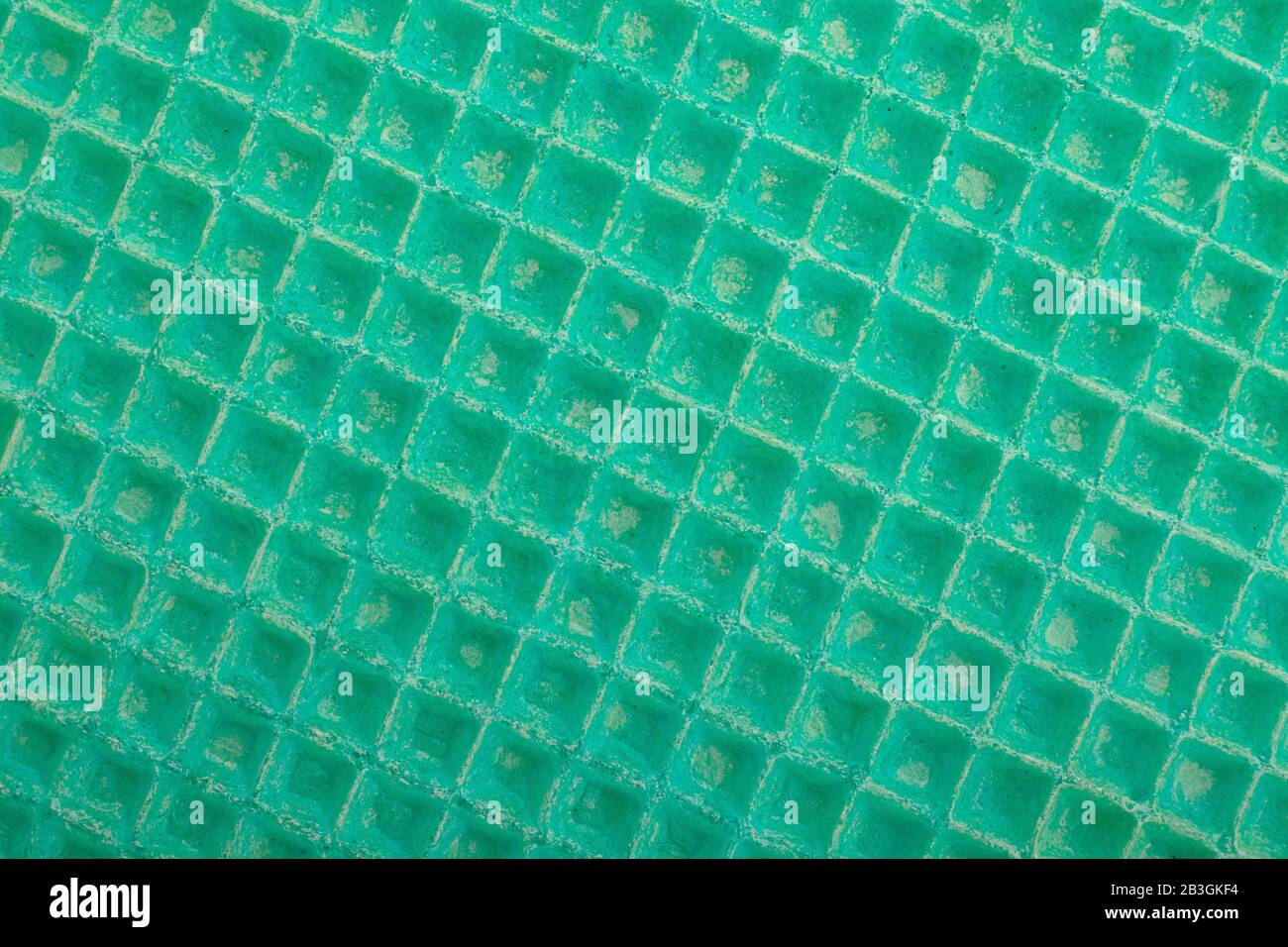 Green waffles surface closeup detail background Stock Photo - Alamy
