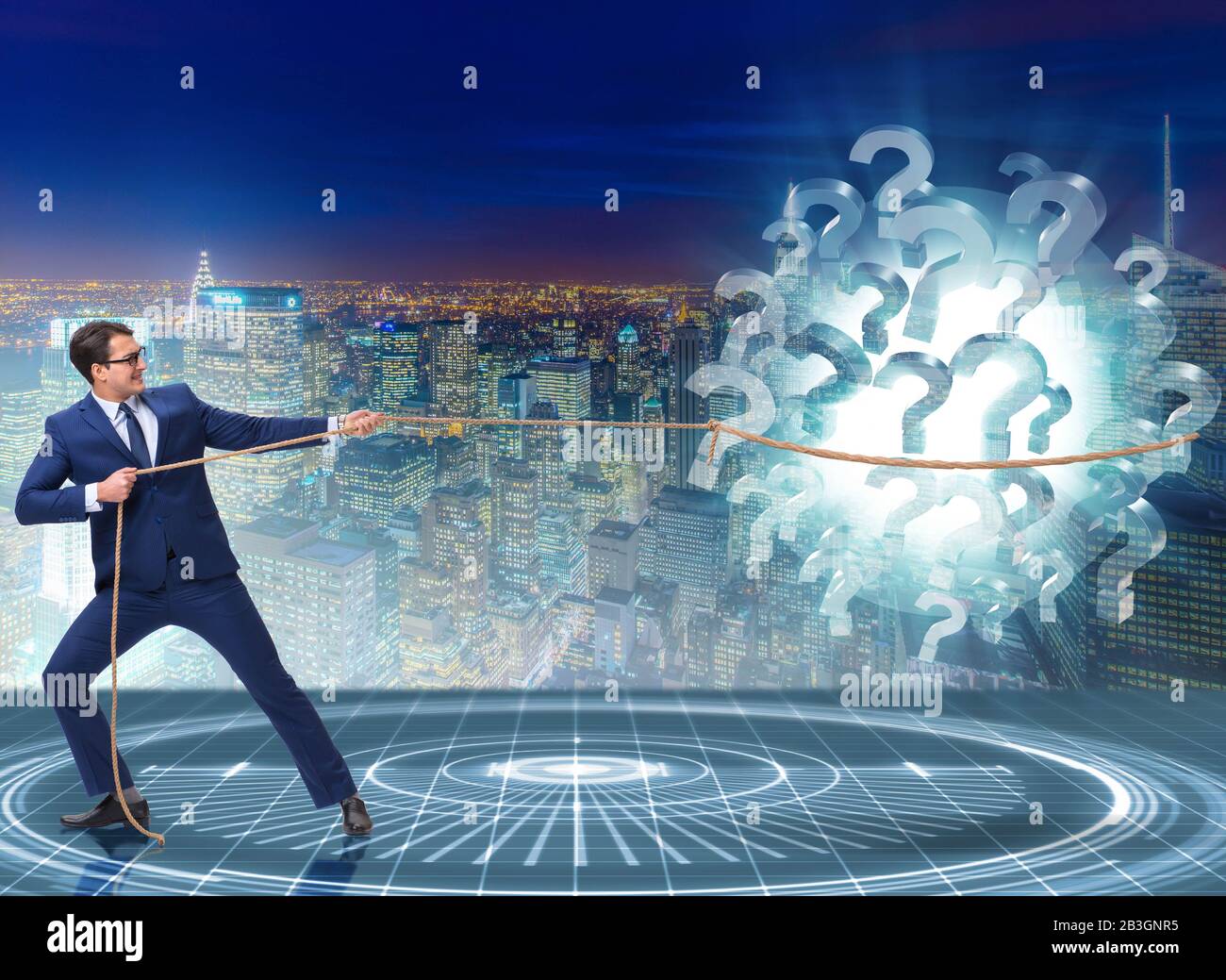 The businessman pulling question marks in uncertainty concept Stock ...