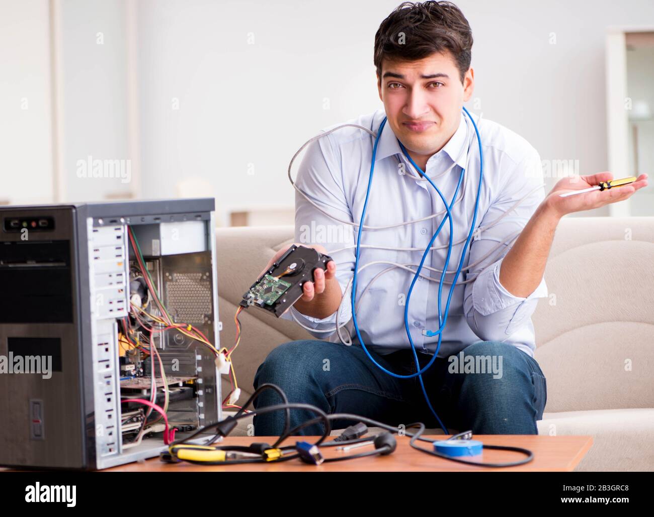 The frustrated man with broken pc computer Stock Photo - Alamy