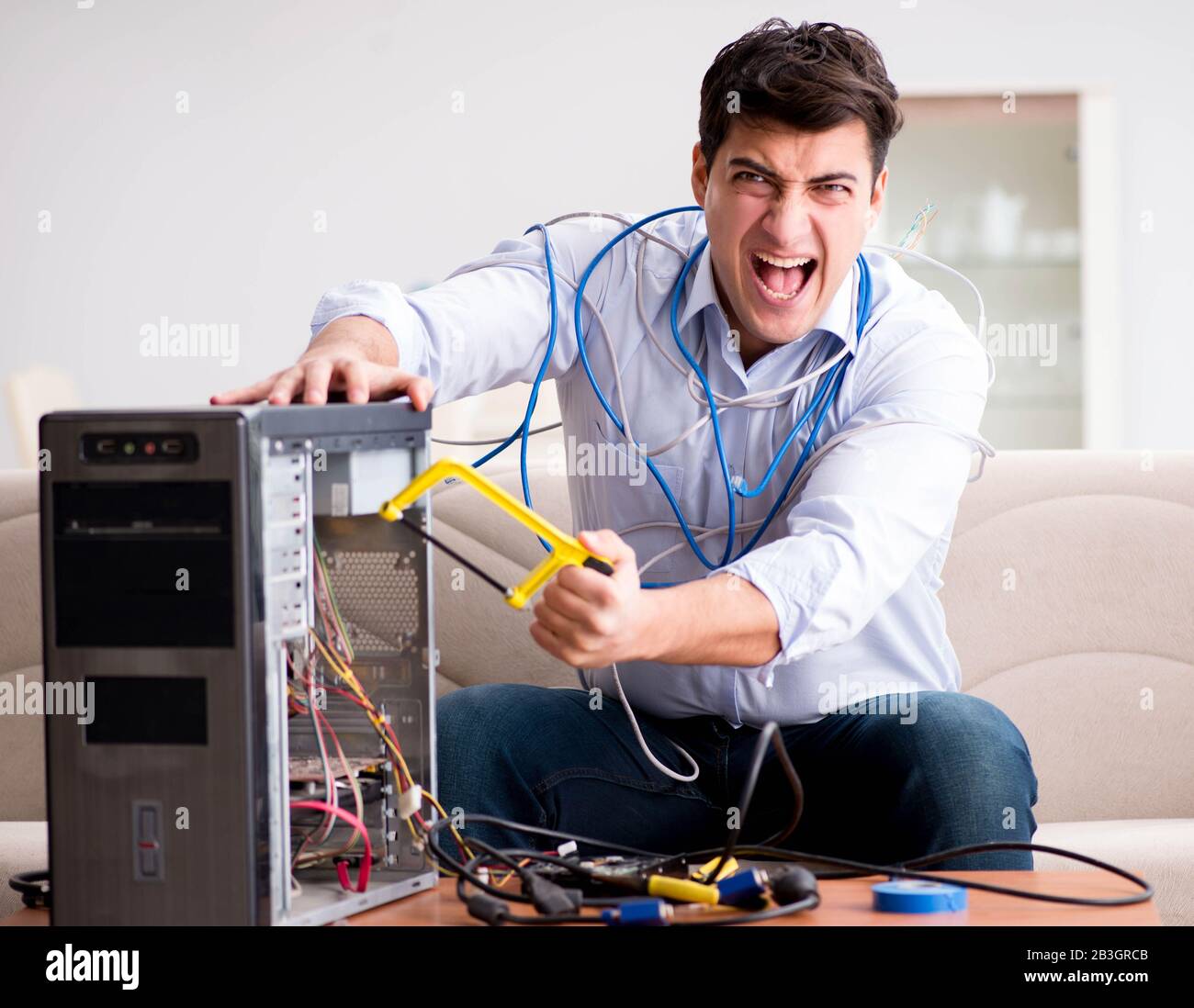 The frustrated man with broken pc computer Stock Photo - Alamy
