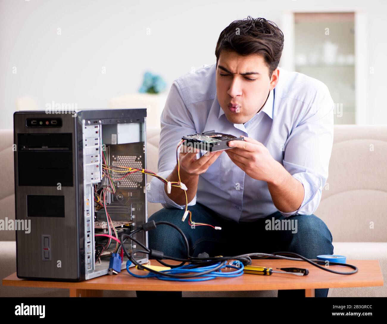 The frustrated man with broken pc computer Stock Photo - Alamy