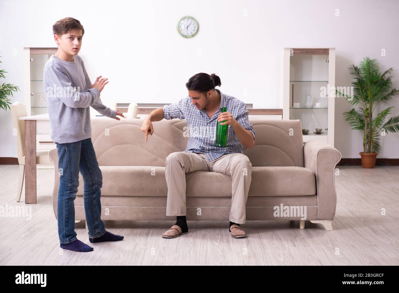 The drunk father and his son Stock Photo - Alamy