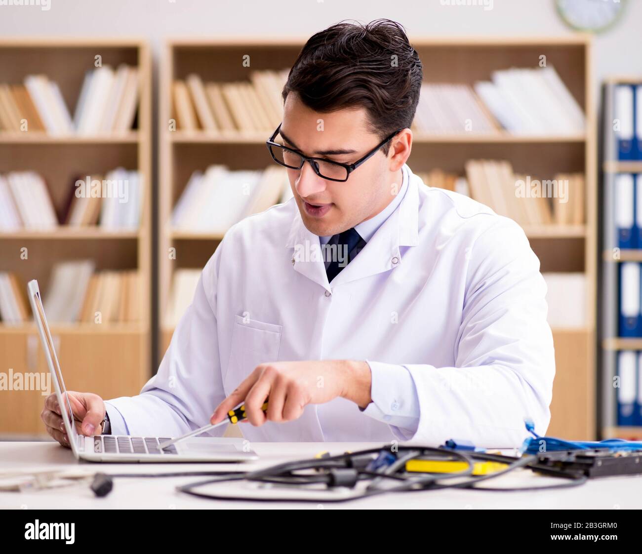 The it technician repairing broken laptop notebook computer Stock Photo ...