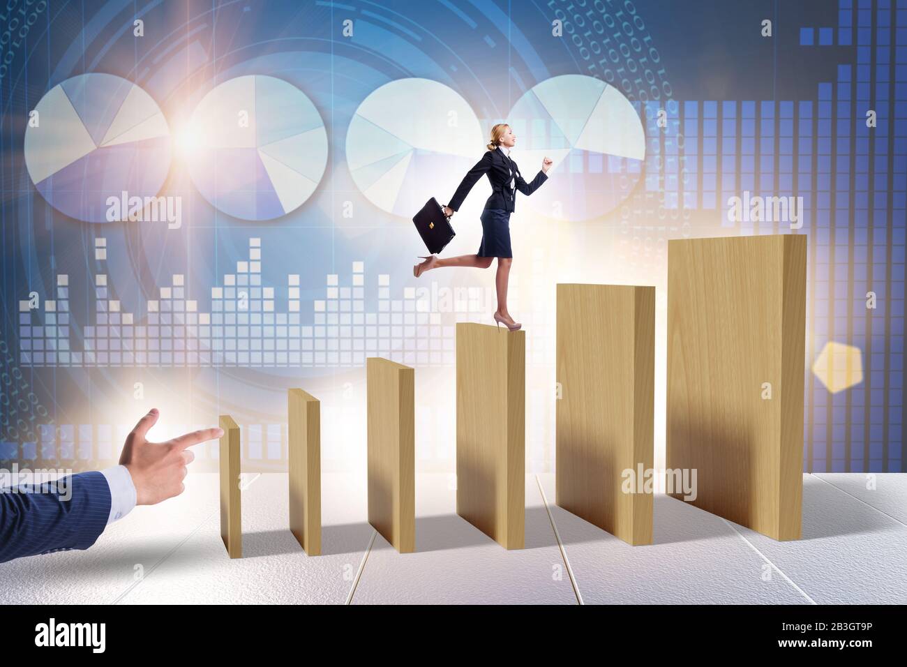 Domino effect and the competition concept Stock Photo - Alamy