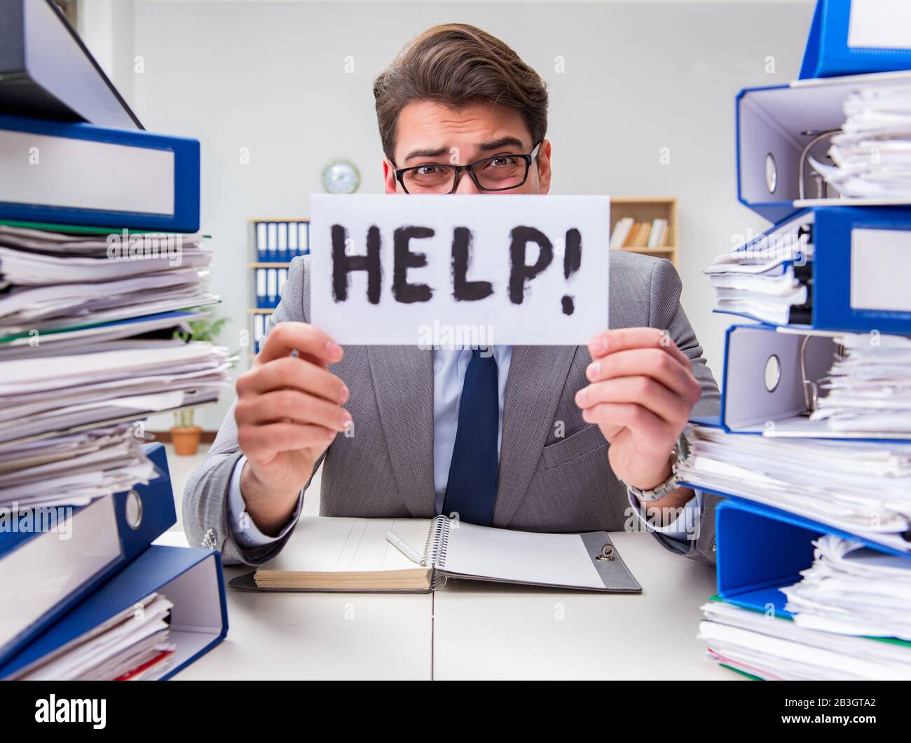 The busy businessman asking for help with work Stock Photo - Alamy