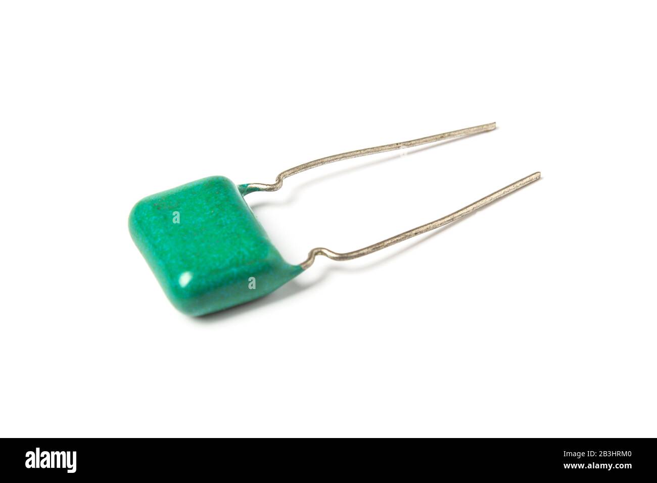 Electric capacitor close-up isolated on white Stock Photo - Alamy