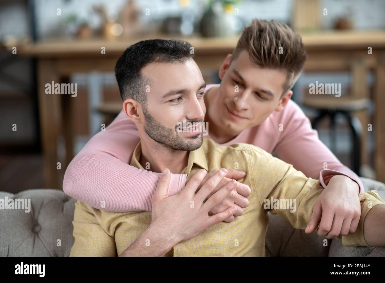 Man shoulder putting hand hi-res stock photography and images - Alamy