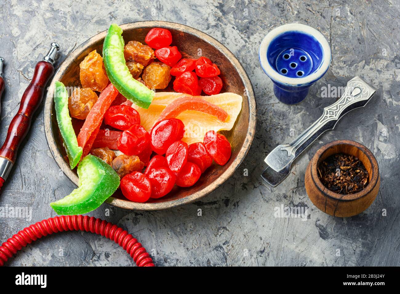Details of oriental hookah and shisha tobacco with candied fruit ...