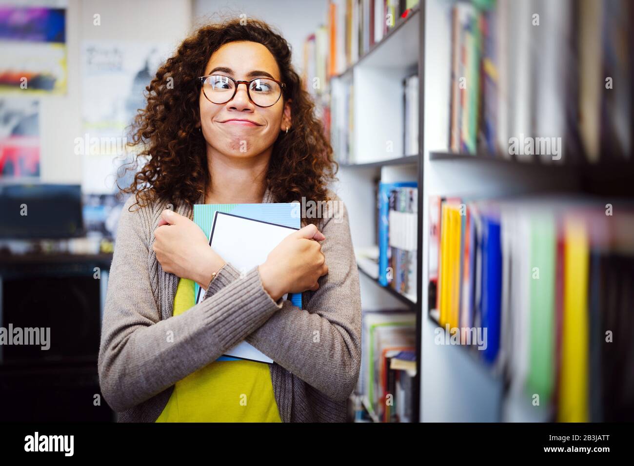 College, study, university and education concept. Cute nerd woman ...
