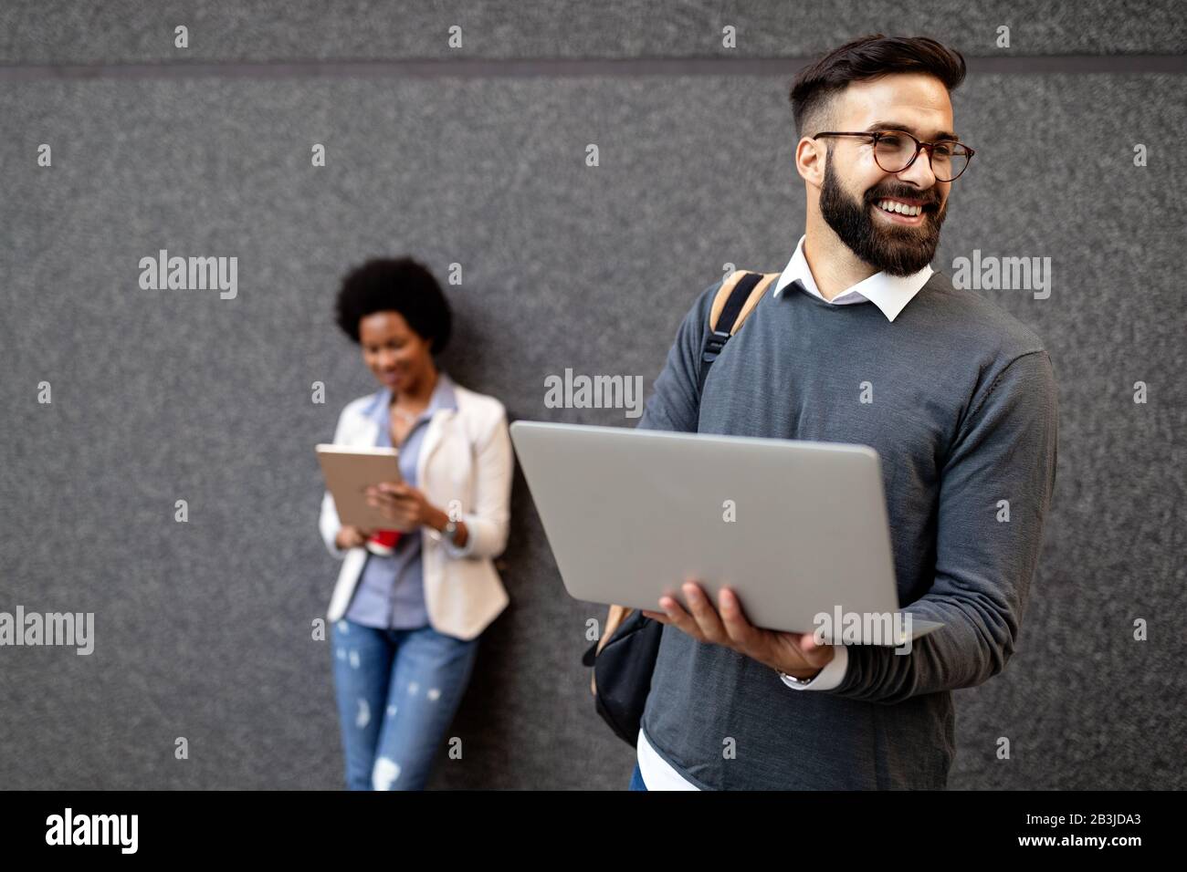People using technology hi-res stock photography and images - Alamy
