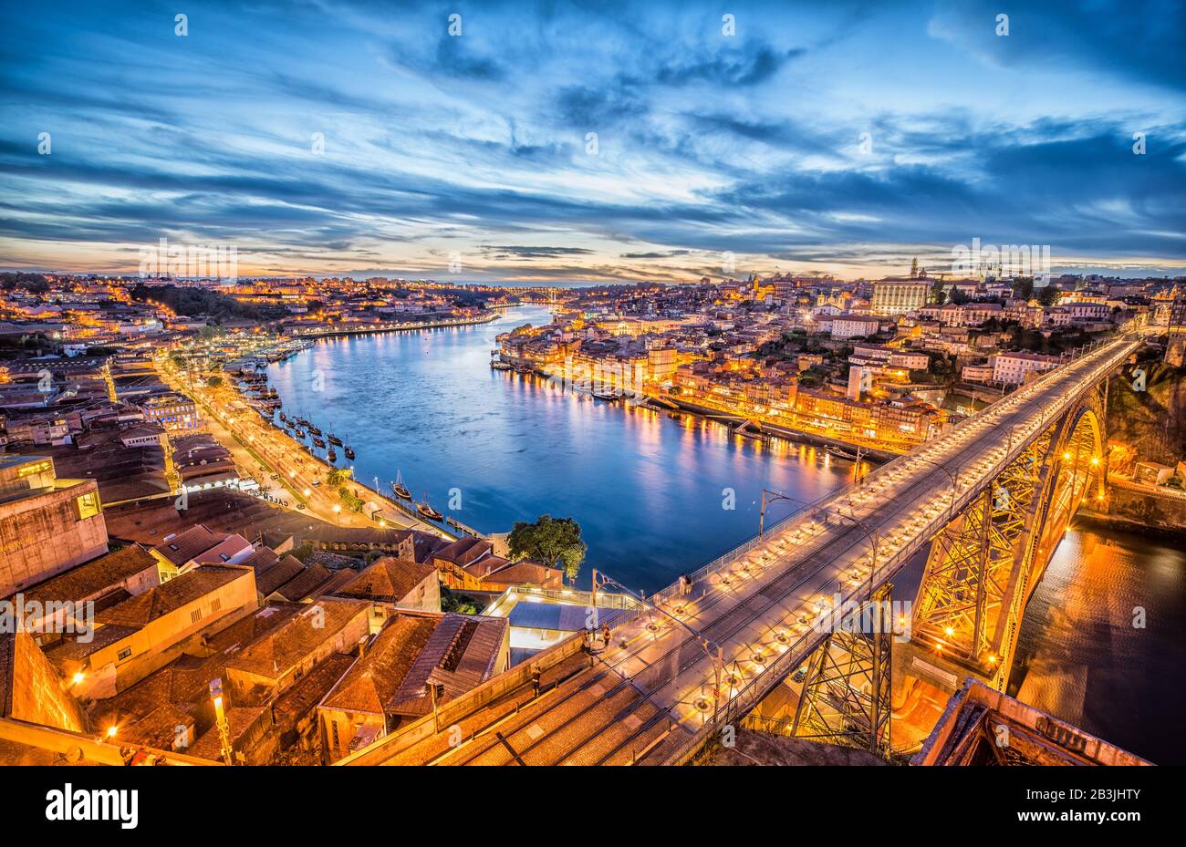 a view over historic porto iconic bridge and the famous port Stock ...