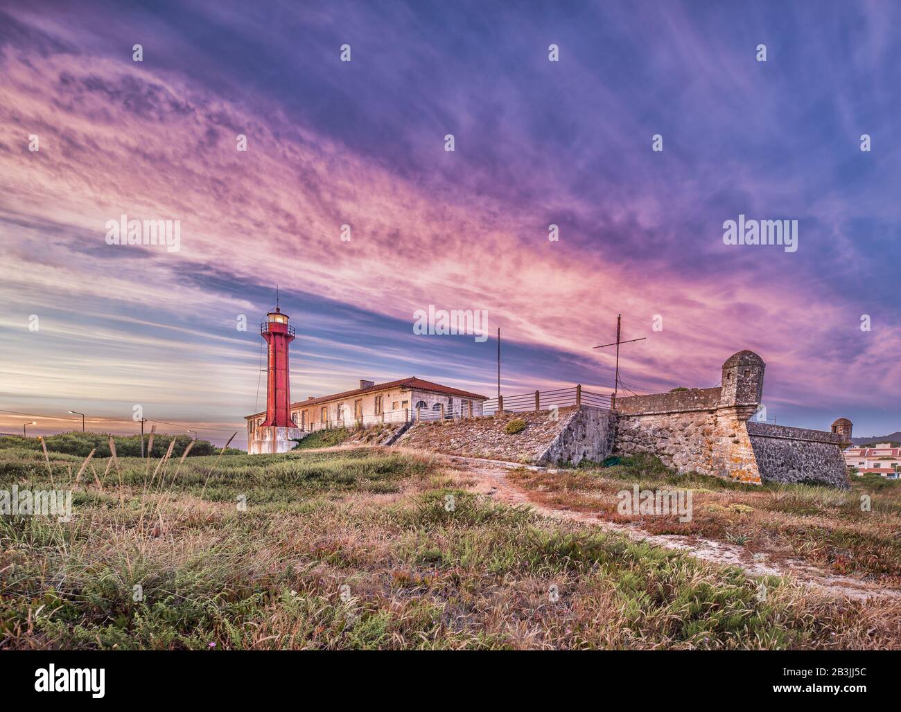 a lighthouse at twilight Stock Photo - Alamy