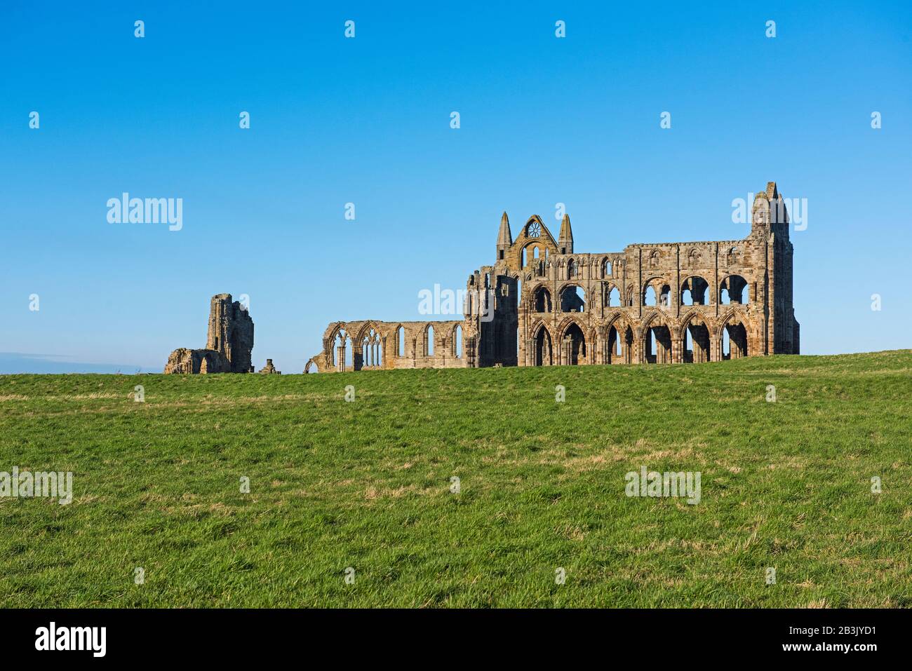 Remains of an ancient english abbey ruins with gothic architecture in ...