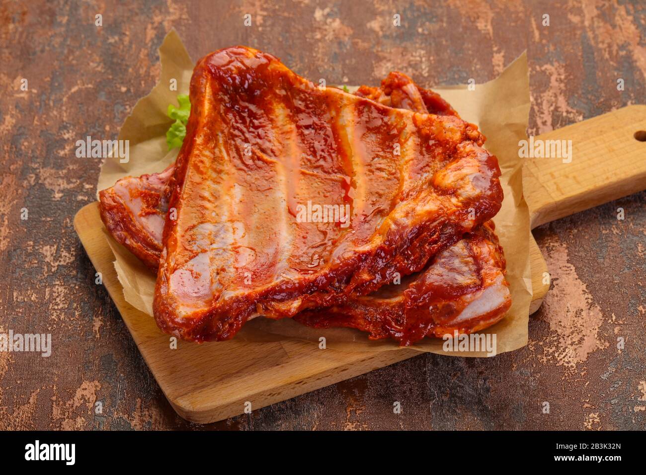 Raw marinated pork ribs ready for cooking Stock Photo - Alamy
