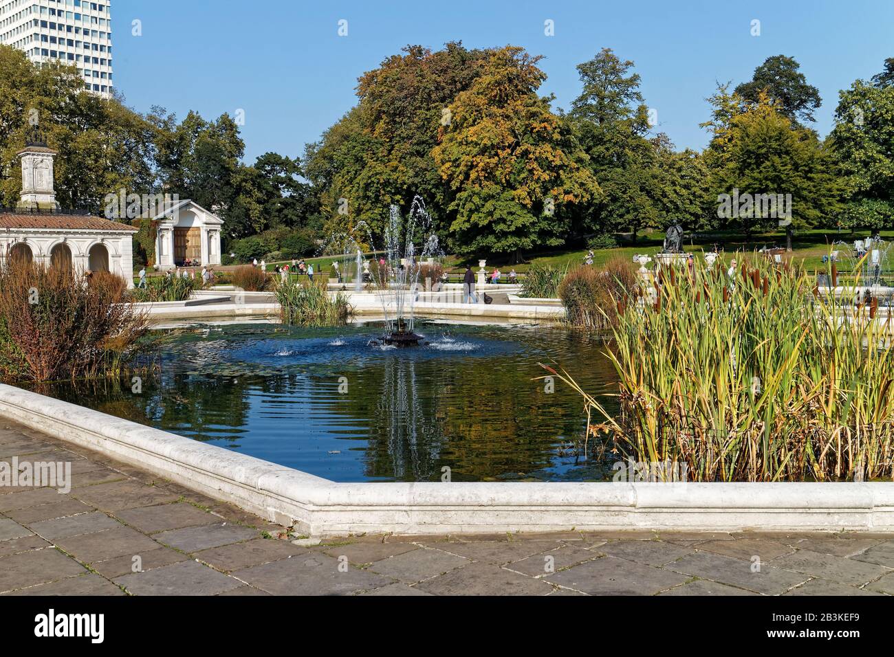 The Italian Garden Ponds with Fountains, Statues and Stone Buildings in ...