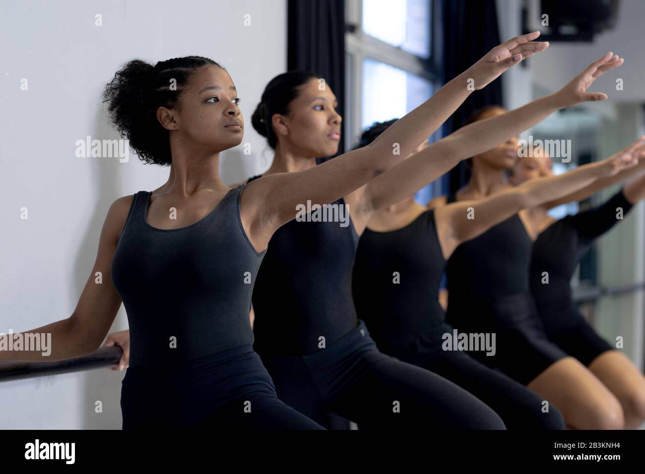 Group of female dancers practicing a dance routine in a studio Stock ...