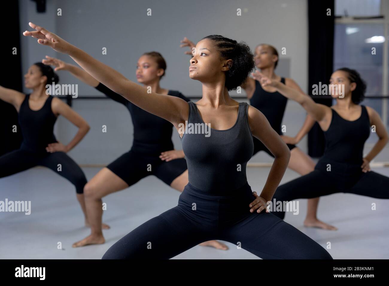 Group of female dancers practicing a dance routine in a studio Stock ...