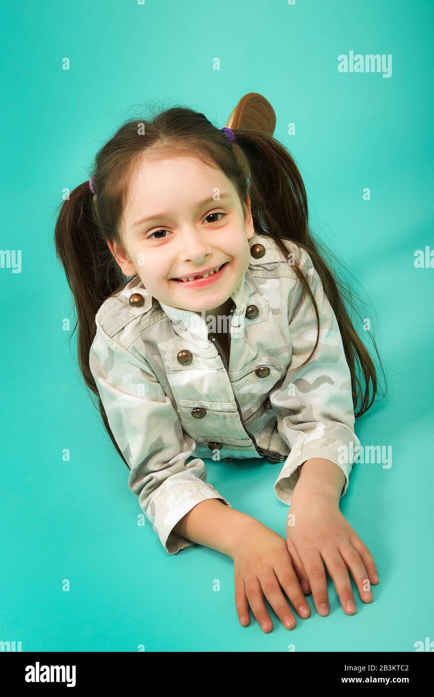 Cute young girl lost a tooth. Child who is missing a front tooth. Funny ...