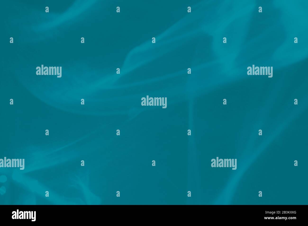 Blue colored abstract background with light and shadows caustic effect ...