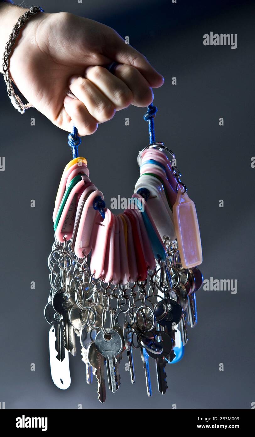 Someone holding keys hi-res stock photography and images - Alamy