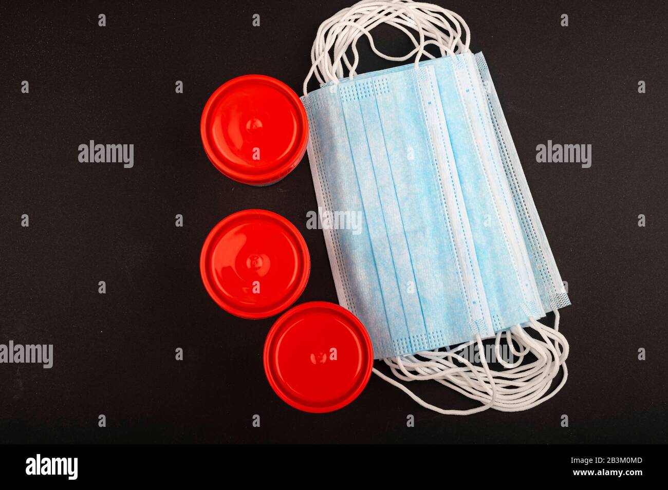 Disposable medical masks and plastic containers for collecting tests on ...